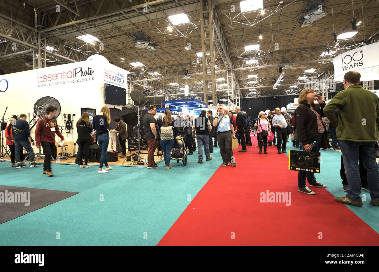 People walking around at a photography show indoor event Stock Photo ...