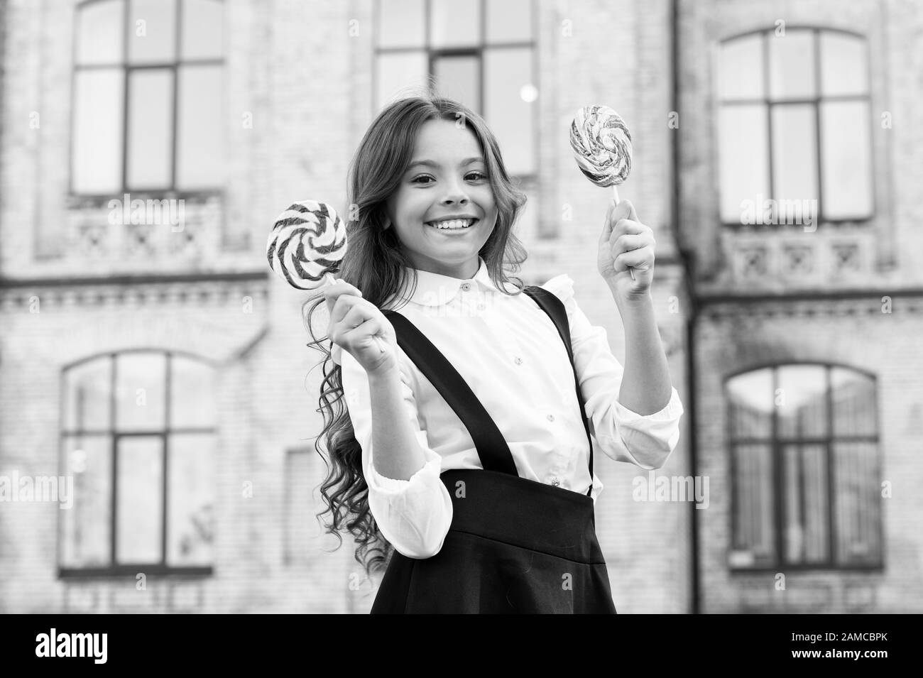 Picking flavour is hardest part. Schoolgirl choosing sweets. Happy kid ...