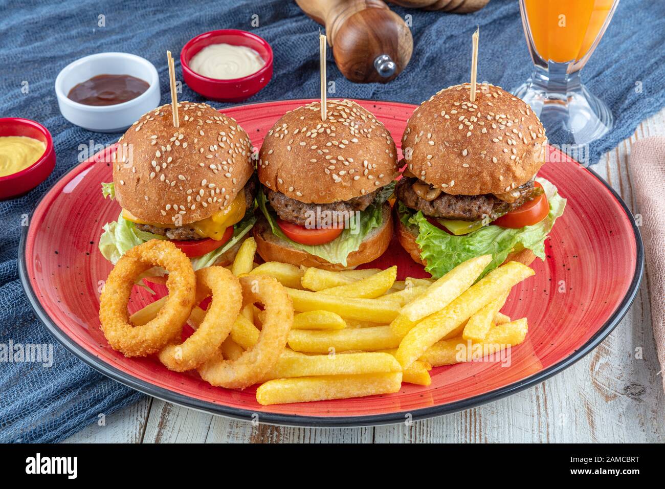 Three mini hamburger. Homemade delicious three mini burgers served with ...