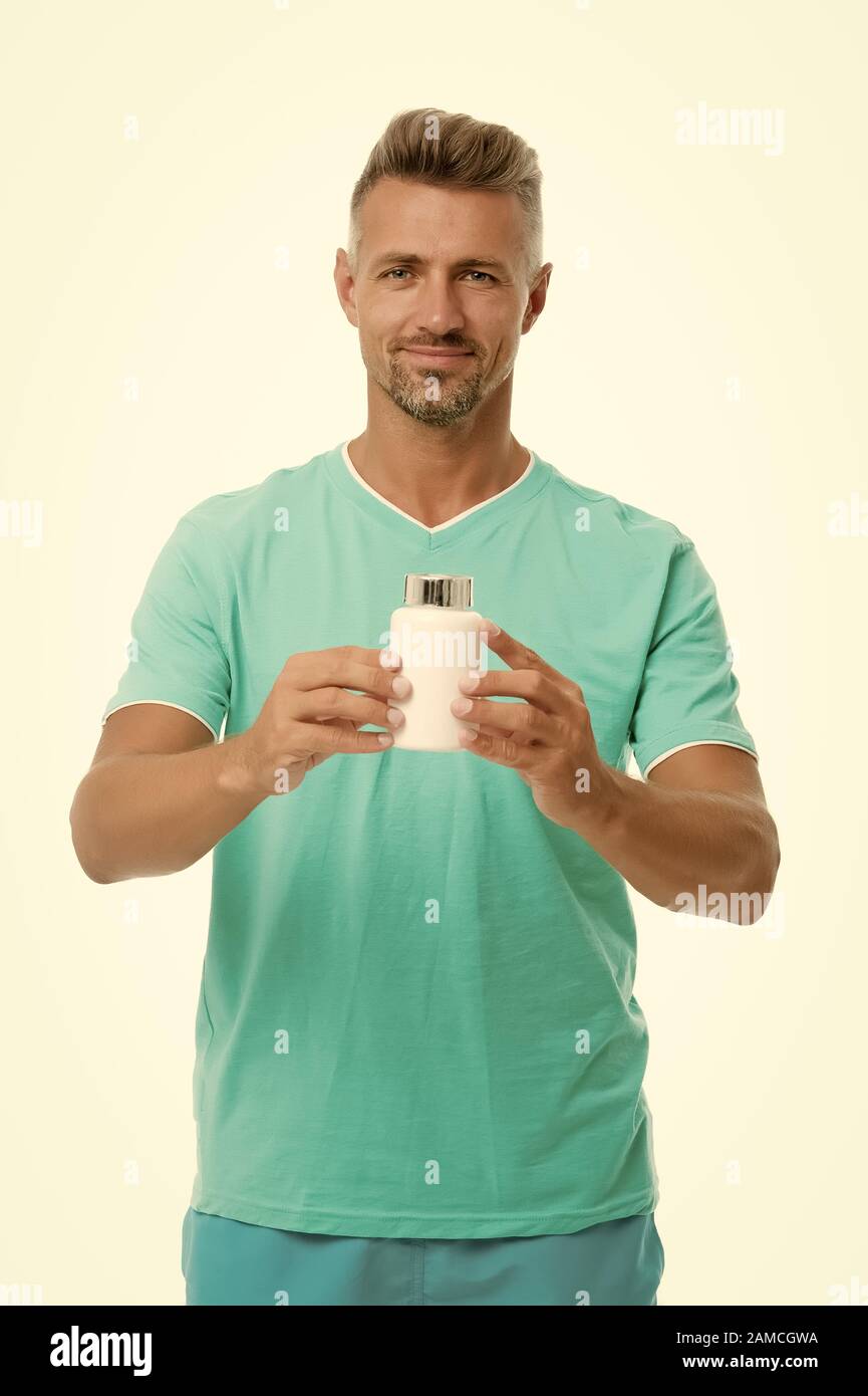 Medicines concept. Health is wealth. Bearded man holding vitamin pill ...