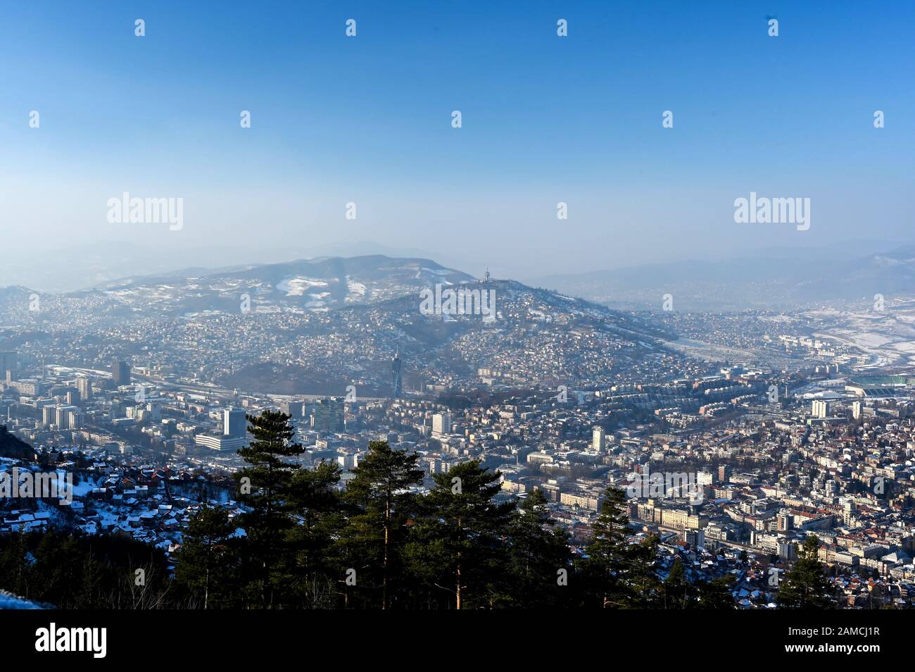Panorama of Sarajevo during the winter in the cloud of smog, life ...