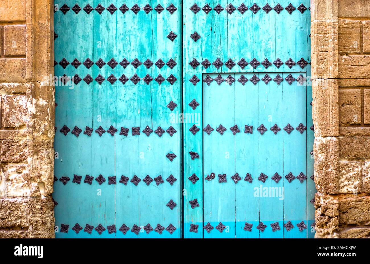 Old rustic wooden doors painted in blue Stock Photo - Alamy