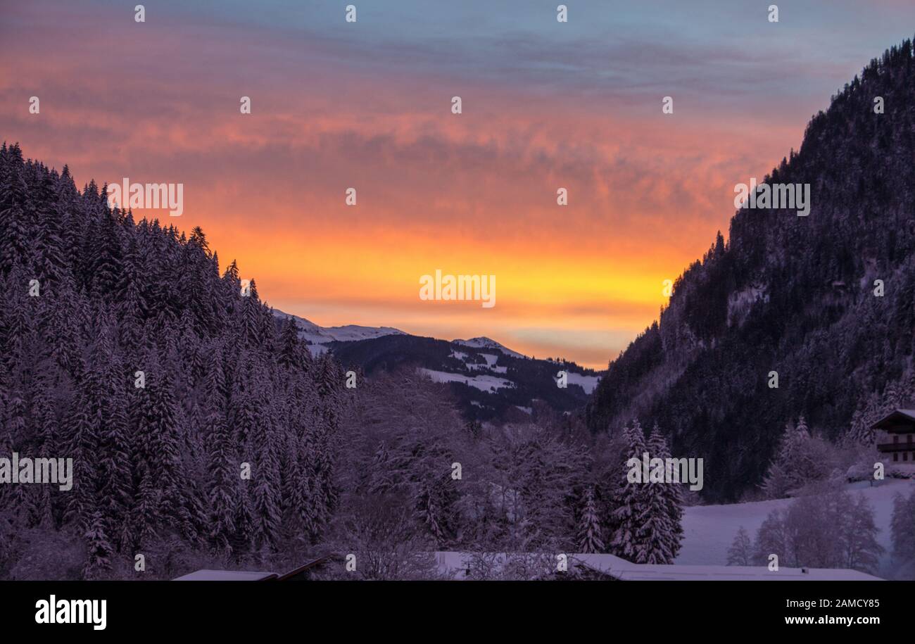 Valley Austria alpes sunset red sky dramatic clouds blue hour Stock ...