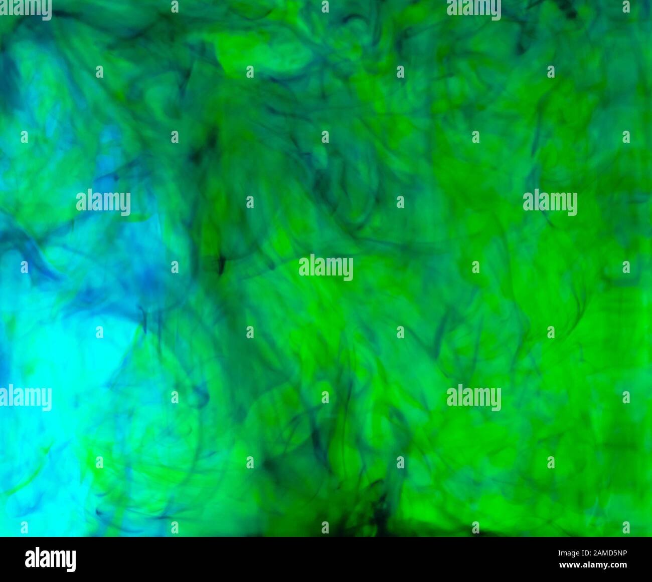 Blurred photo of food color drop and dissolve in water for background ...