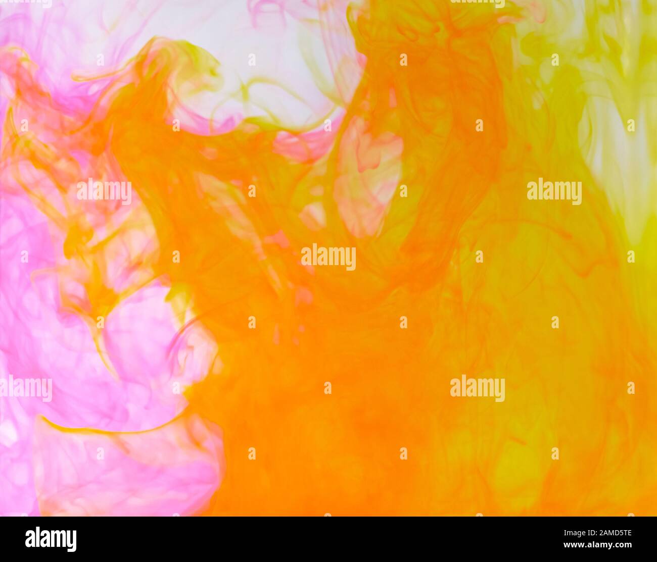 Blurred photo of food color drop and dissolve in water for background ...