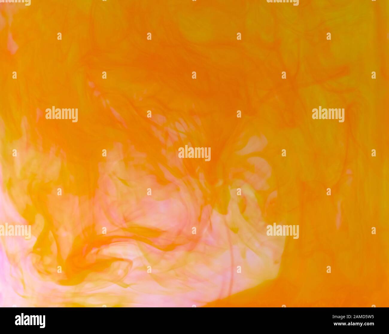 Blurred photo of food color drop and dissolve in water for background ...