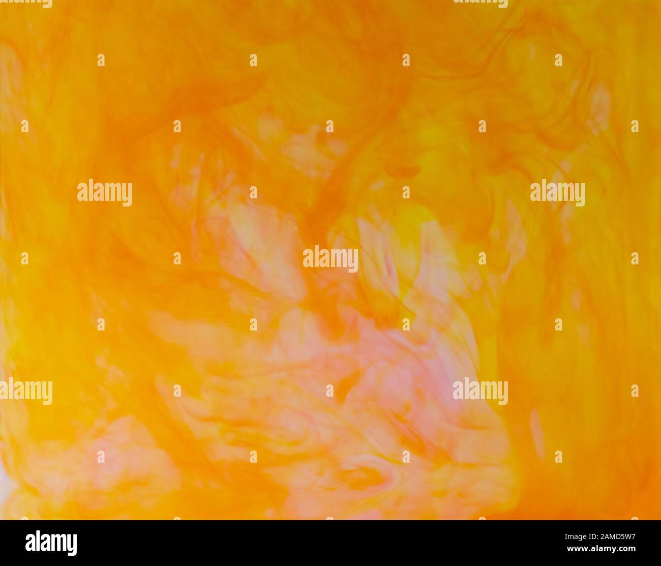 Blurred photo of food color drop and dissolve in water for background ...