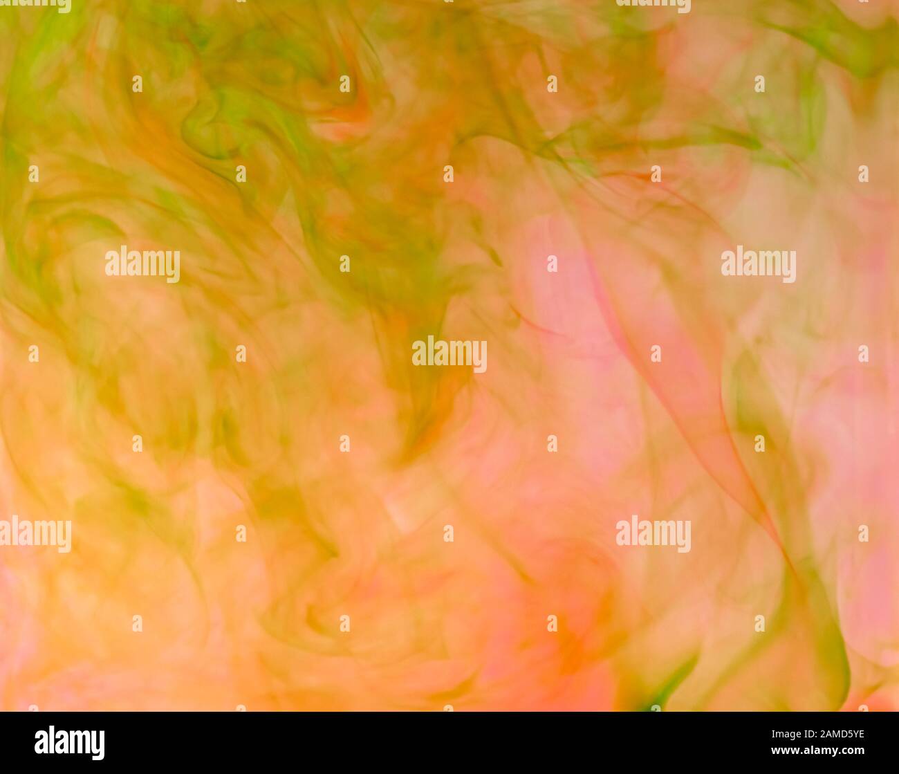 Blurred photo of food color drop and dissolve in water for background ...