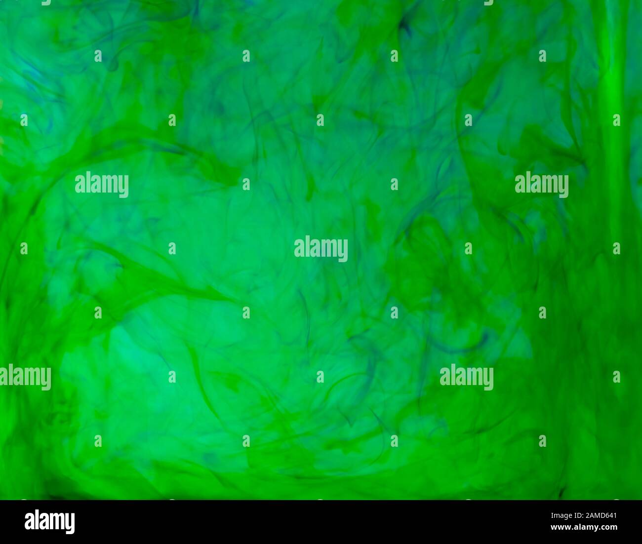 Blurred photo of food color drop and dissolve in water for background ...