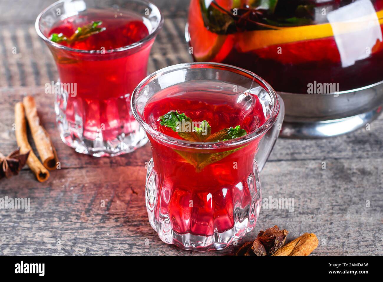 Oriental berry red tea with spices on wooden table background Stock ...