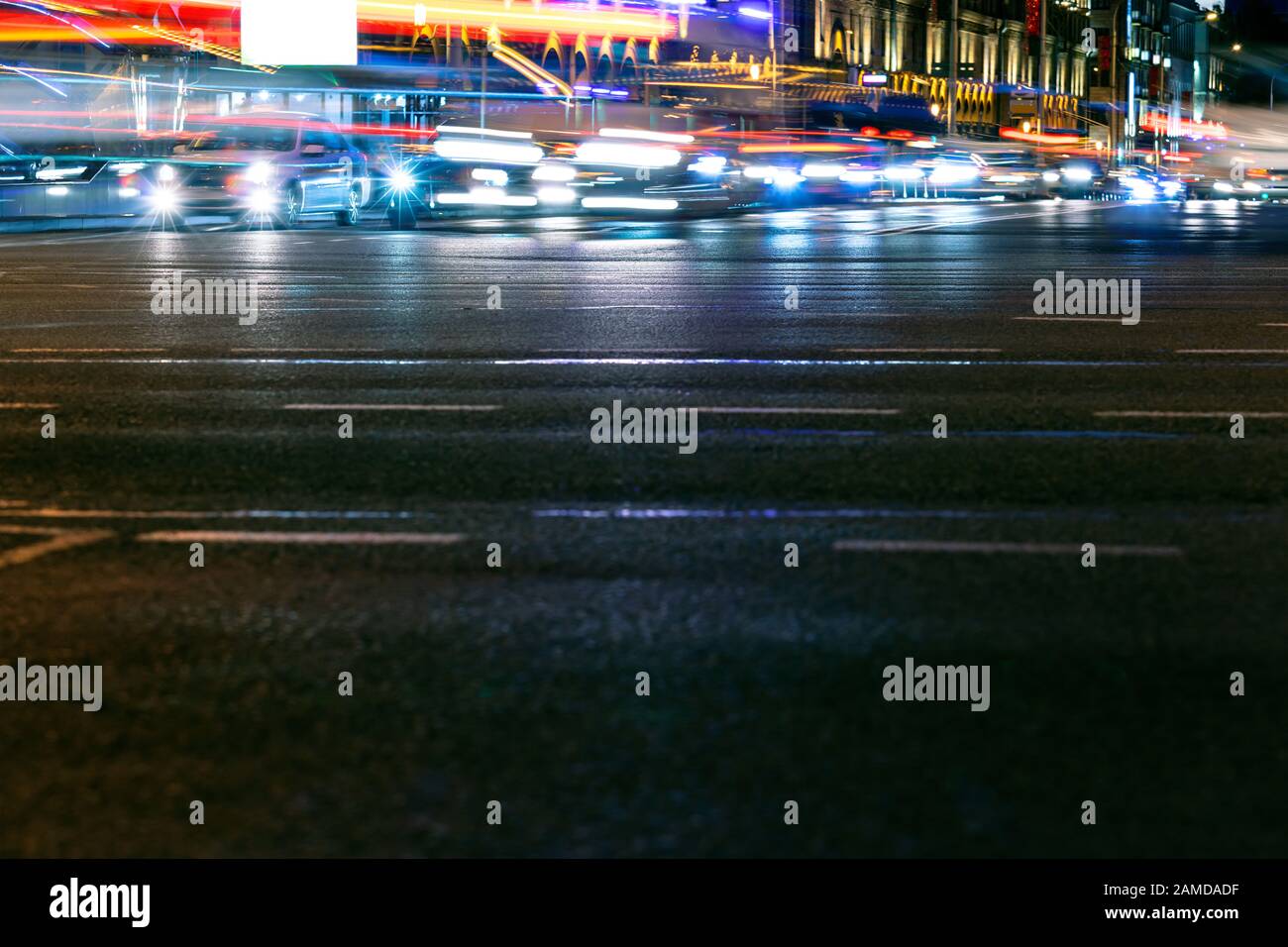 light trails at night street, long exposure image of heavy traffic ...