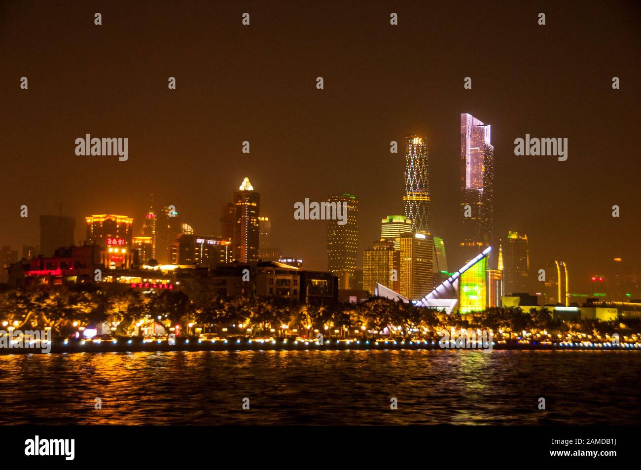 Night view of Guangzhou’s skyscrapers from a river cruise on the Pearl ...