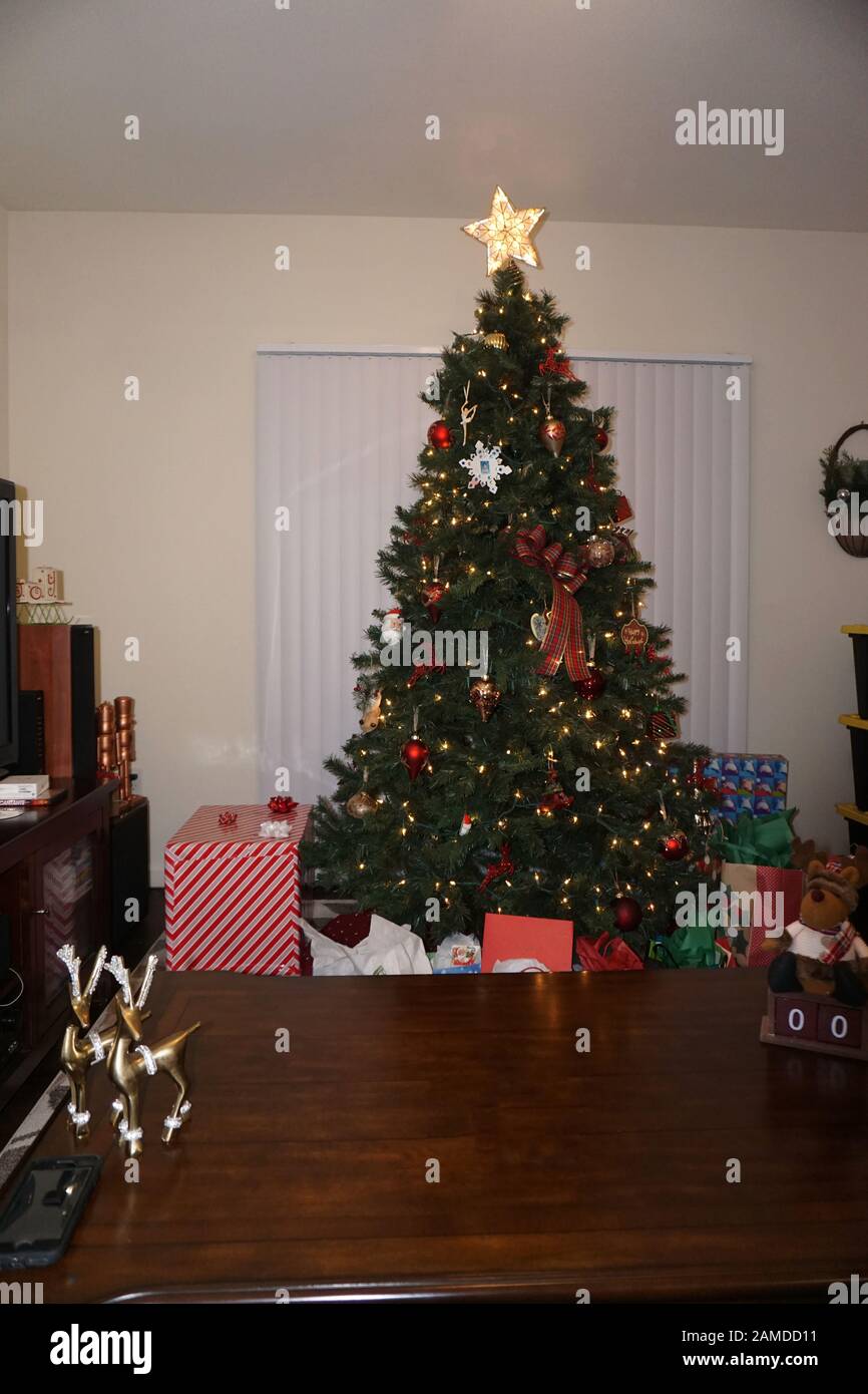 Christmas Tree with Presents Stock Photo - Alamy