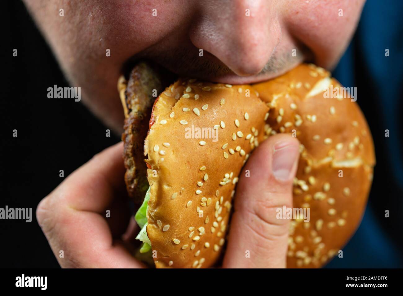 Man eats sandwich hi-res stock photography and images - Alamy