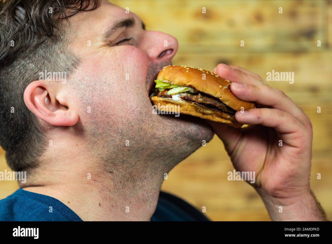 Man eats hi-res stock photography and images - Alamy