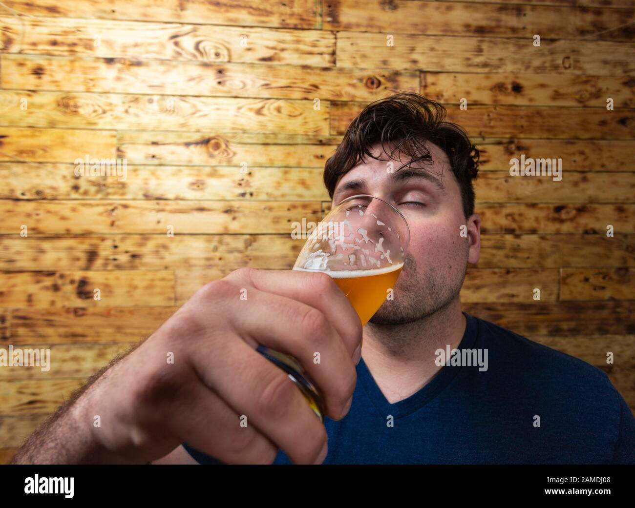 Portrait of thoughtful men drinking beer. Men drinking beer. Handsome ...