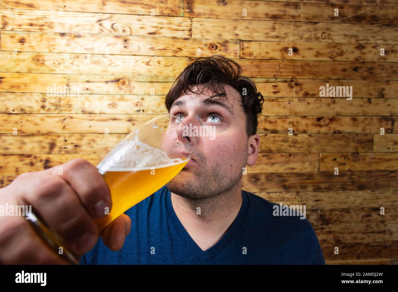 Portrait of thoughtful men drinking beer. Men drinking beer. Handsome ... Portrait of thoughtful men drinking beer. Men drinking beer. Handsome ...