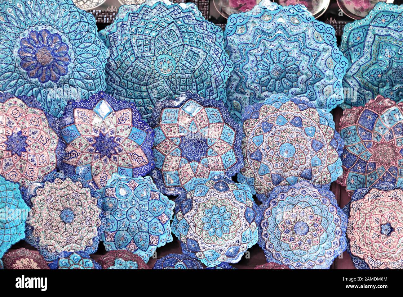 Traditional Iranian souvenirs - copper plates and dishes with floral ...