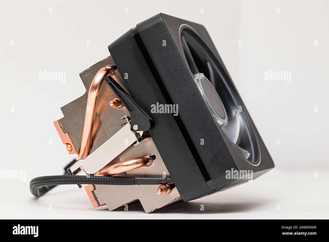 Modern cpu cooler with heat-pipes on white background Stock Photo - Alamy