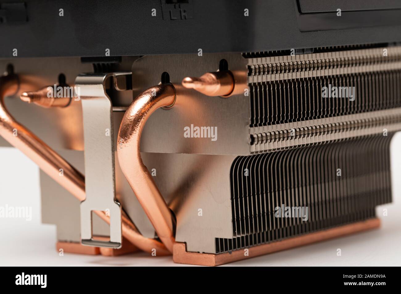 Modern cpu cooler with heat-pipes on white background Stock Photo - Alamy