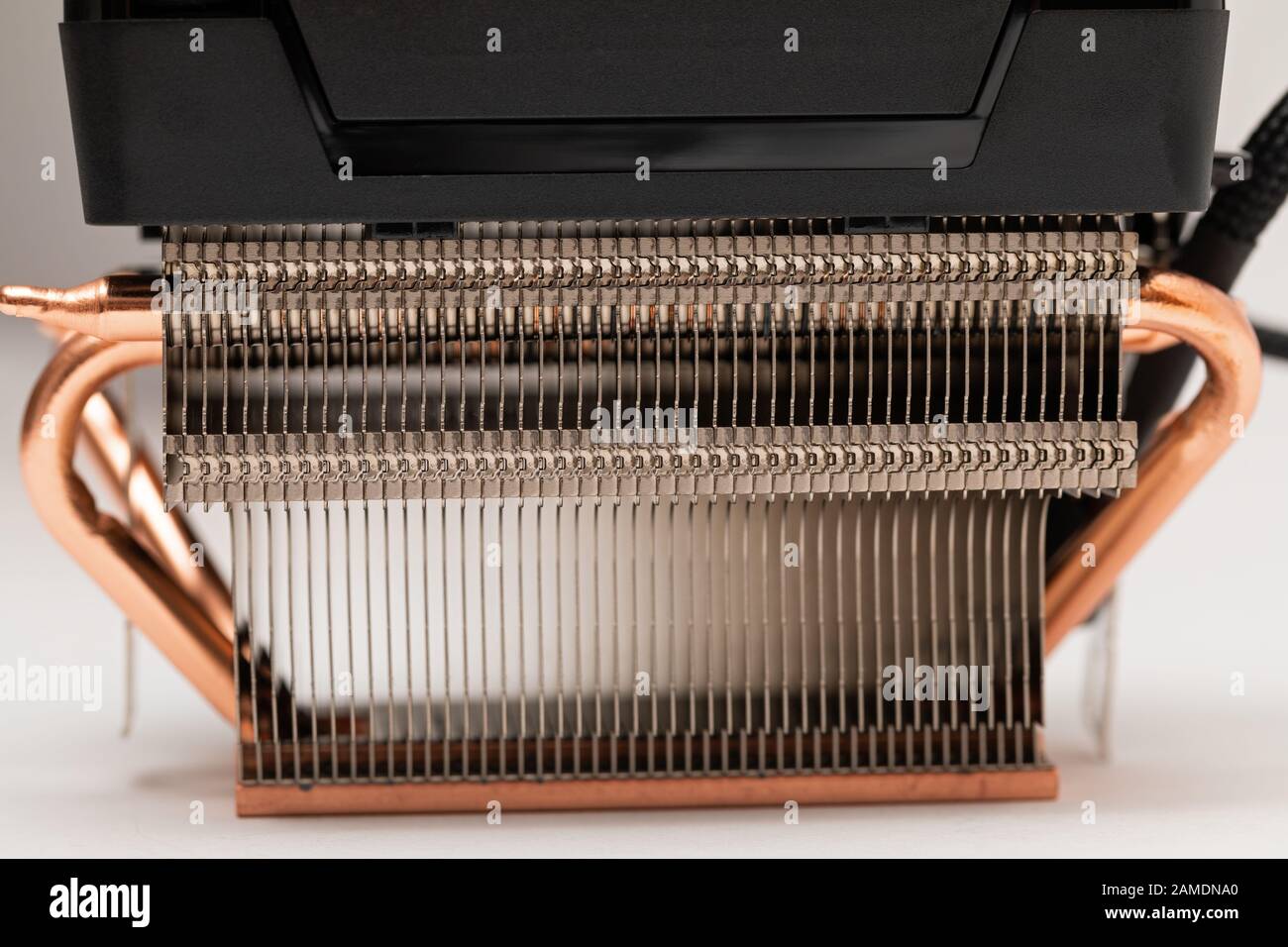 Modern cpu cooler with heat-pipes on white background Stock Photo - Alamy