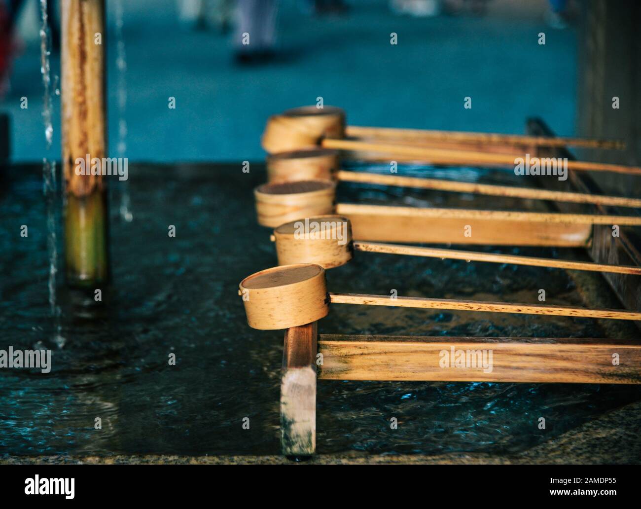 Japanese ladles at Shinto temple in Kyoto, Japan. In Japan, a tsukubai ...