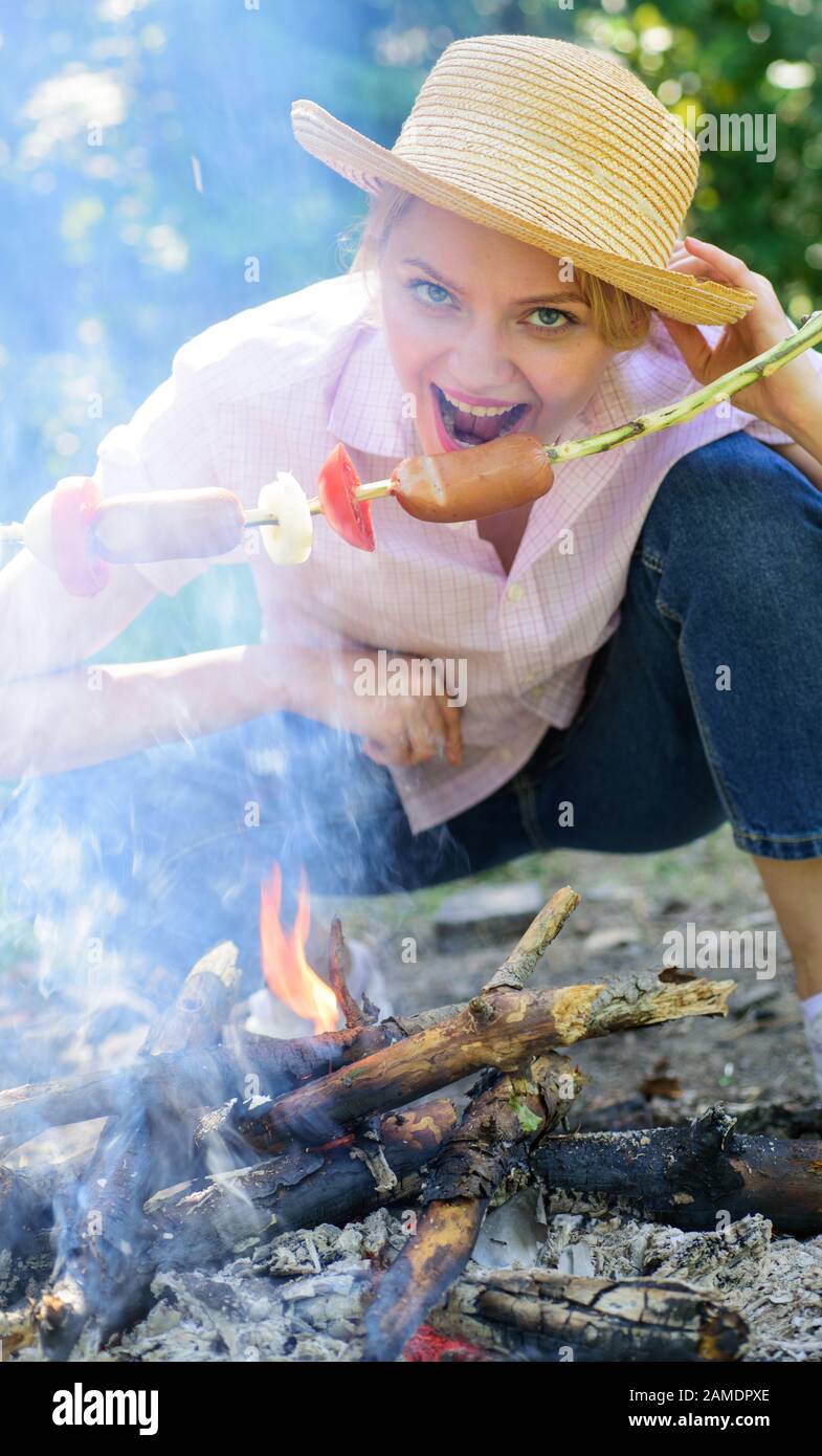 Woman eats sausage hi-res stock photography and images - Alamy