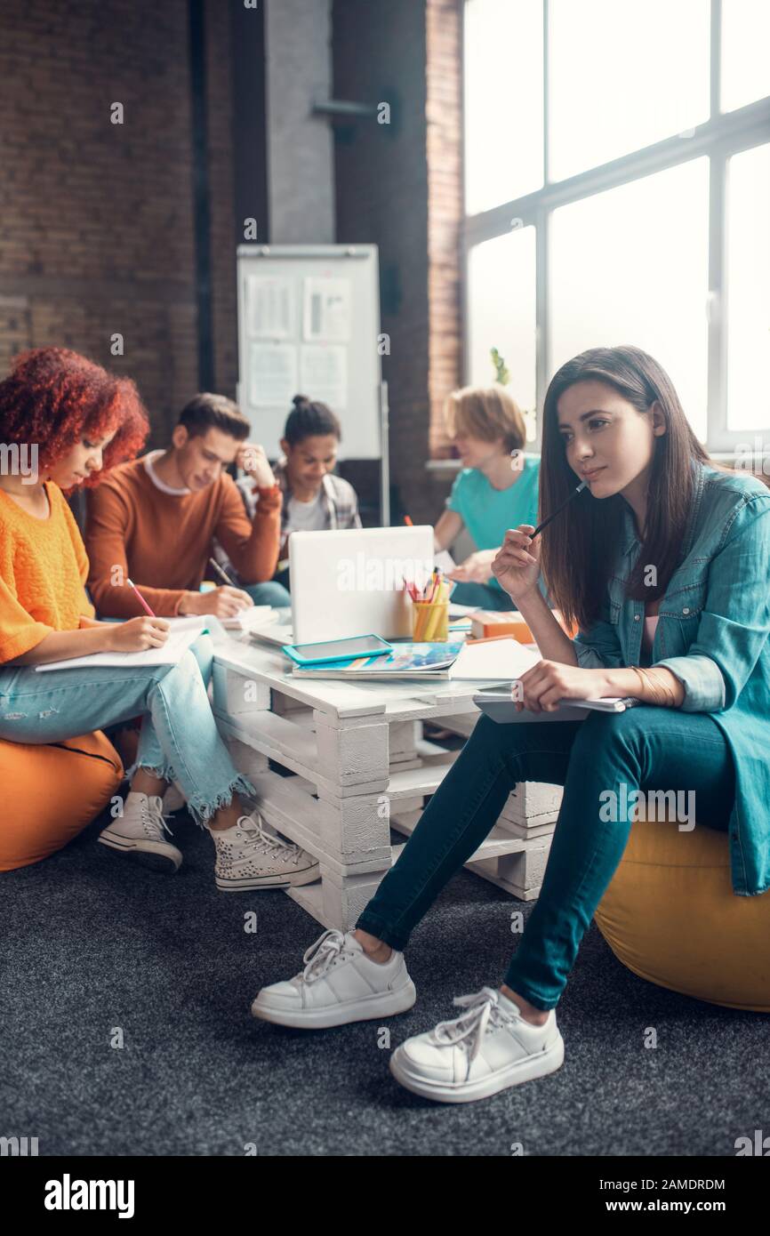 Group of students feeling involved in studying before important exam ...