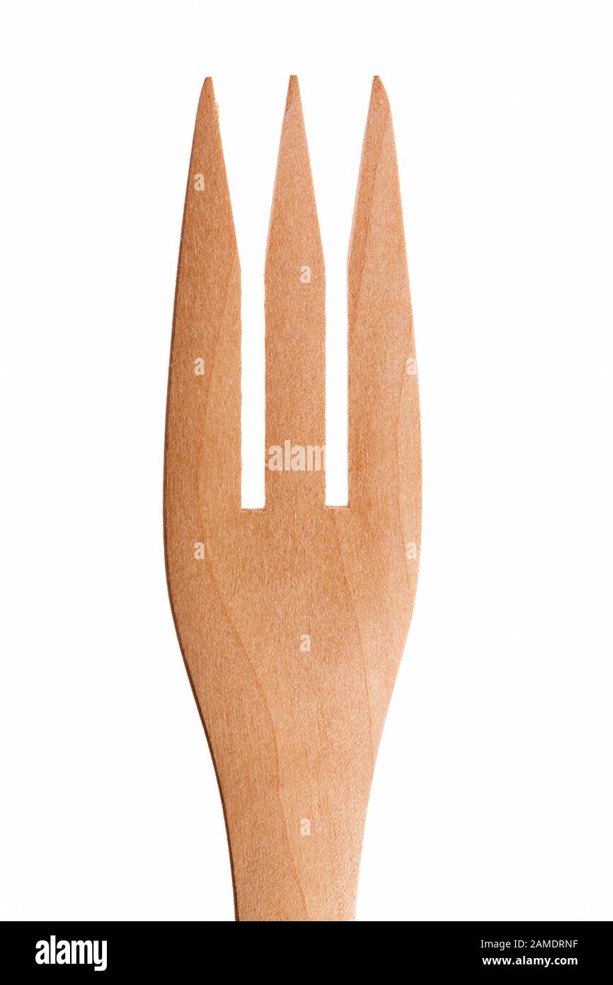 Wooden fork close-up, isolated on a white Stock Photo - Alamy