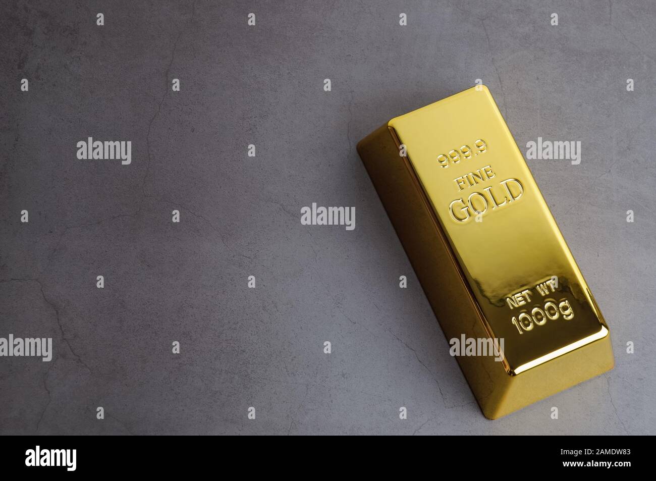 An ingot of gold metal bullion of pure brilliant diagonally located on ...