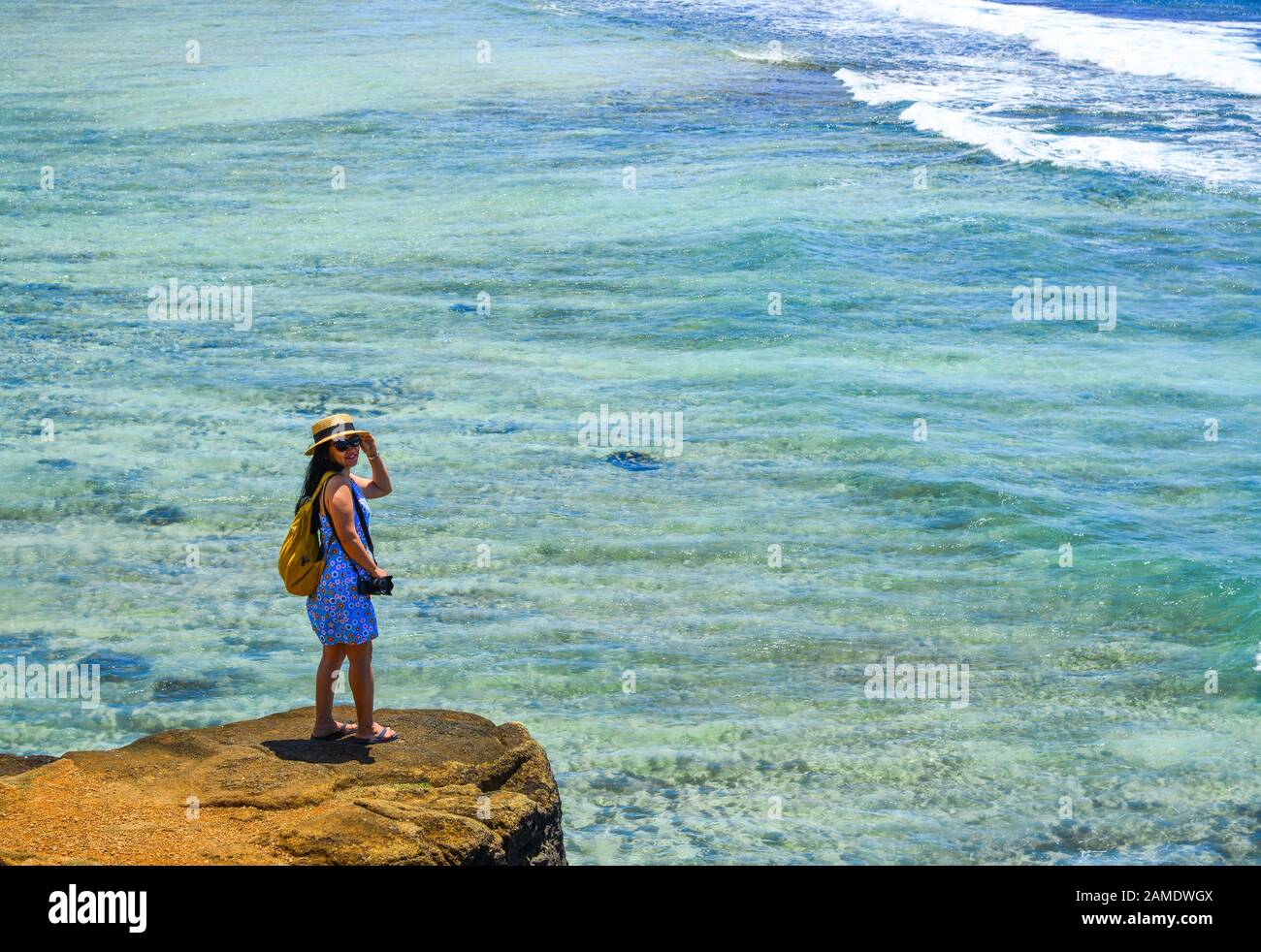People enjoying beautiful seascape on Mauritius Island. Mauritius is ...