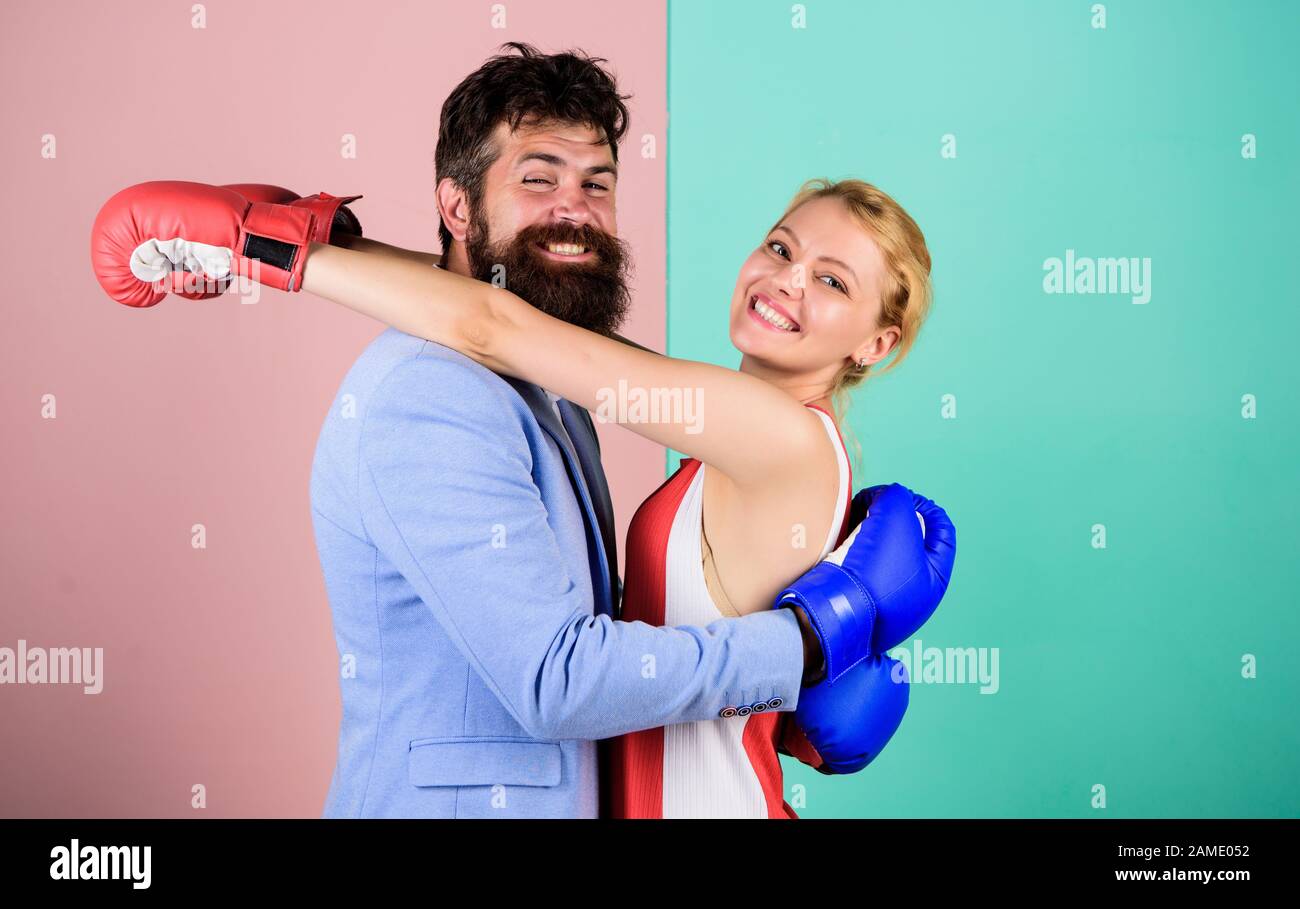 Difficult relationships. Couple in love competing boxing. Conflict ...