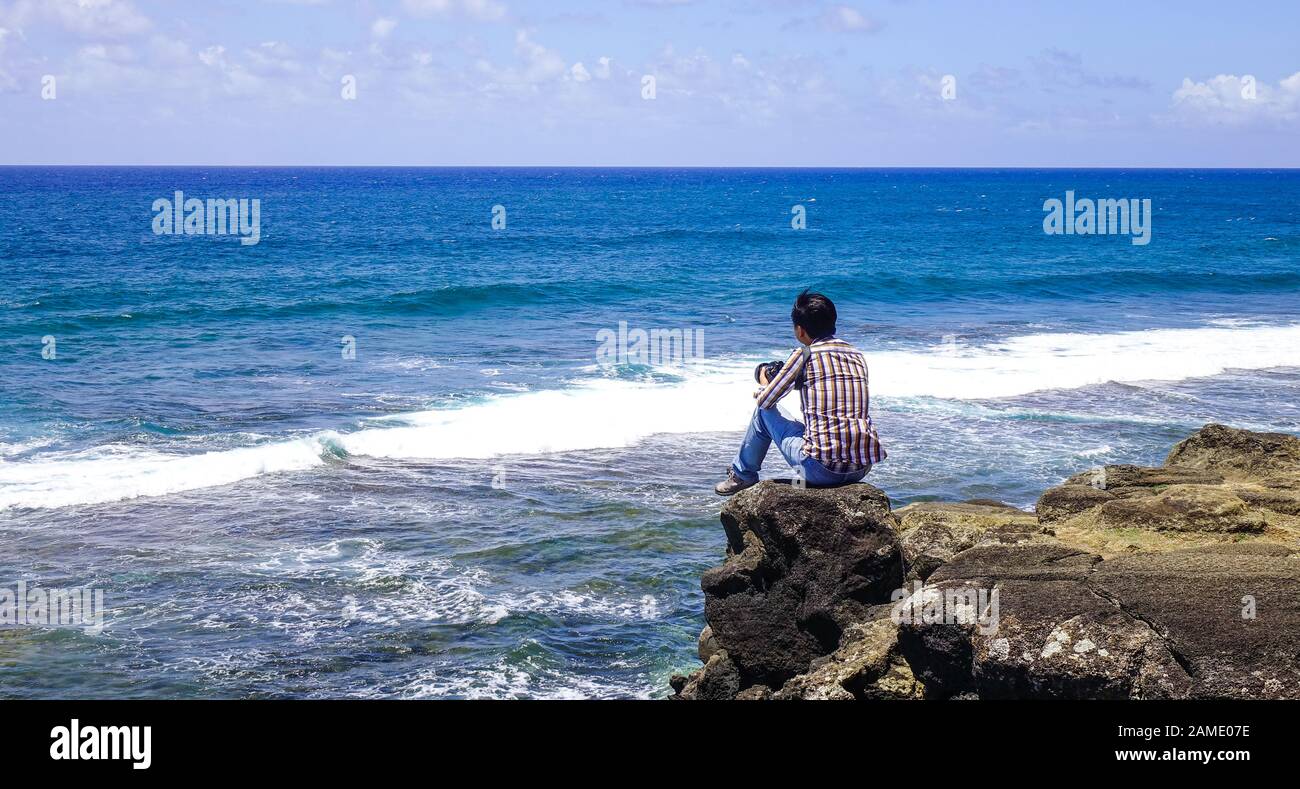 People enjoying beautiful seascape on Mauritius Island. Mauritius is ...