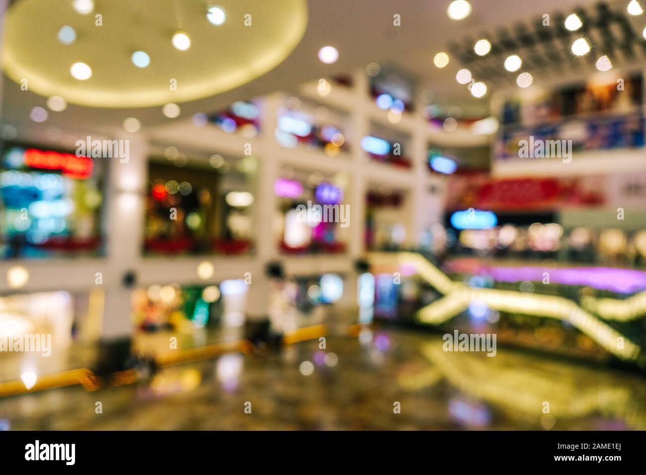 Defocused of shopping mall background. Blurred of colorful lights at ...