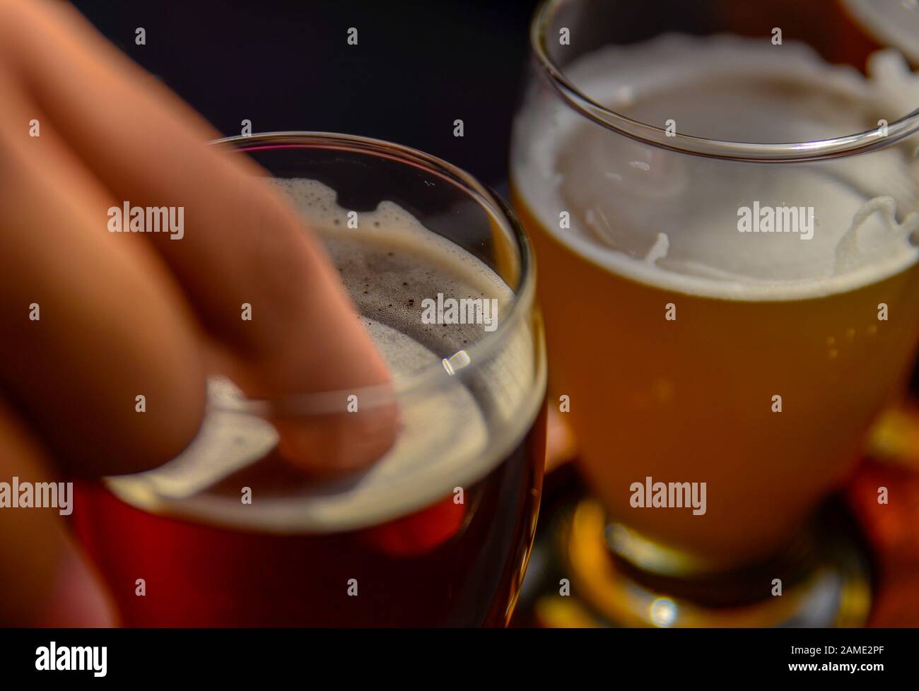 Craft beer tasting: five glasses with beers of different colors and ...