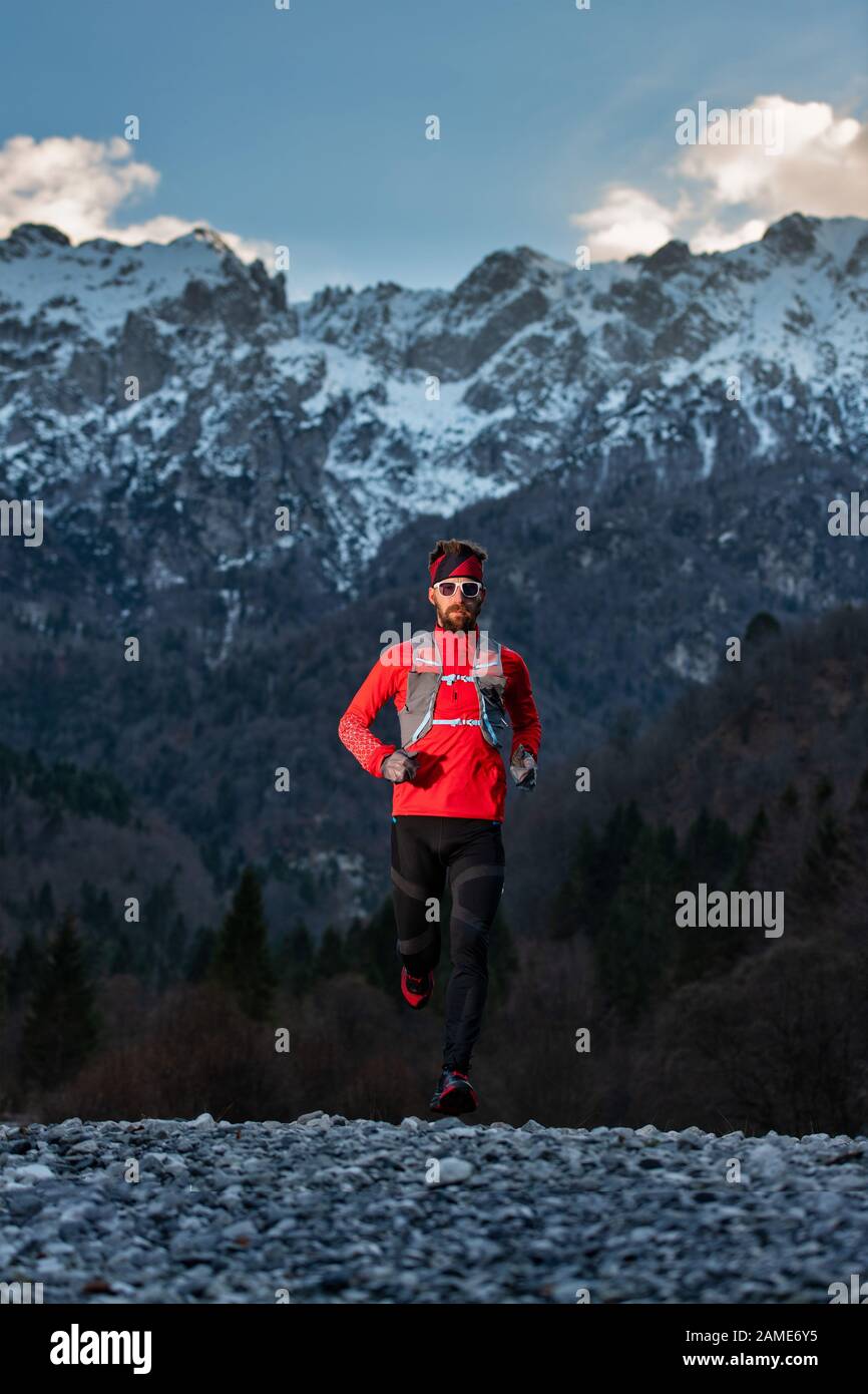 Long distance running athlete during a cold mountain workout Stock ...