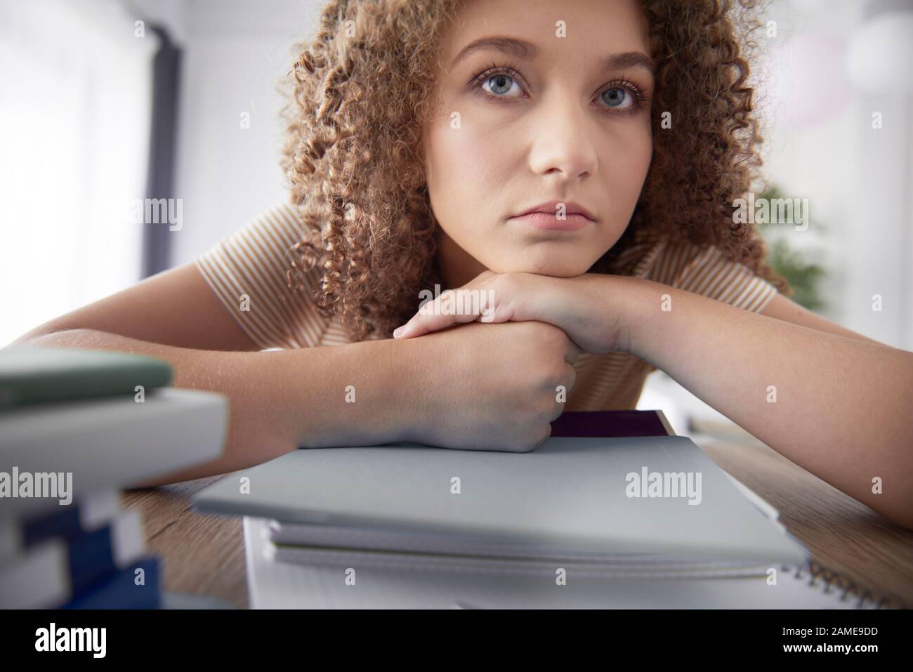 Bored teenager and classroom hi-res stock photography and images - Alamy