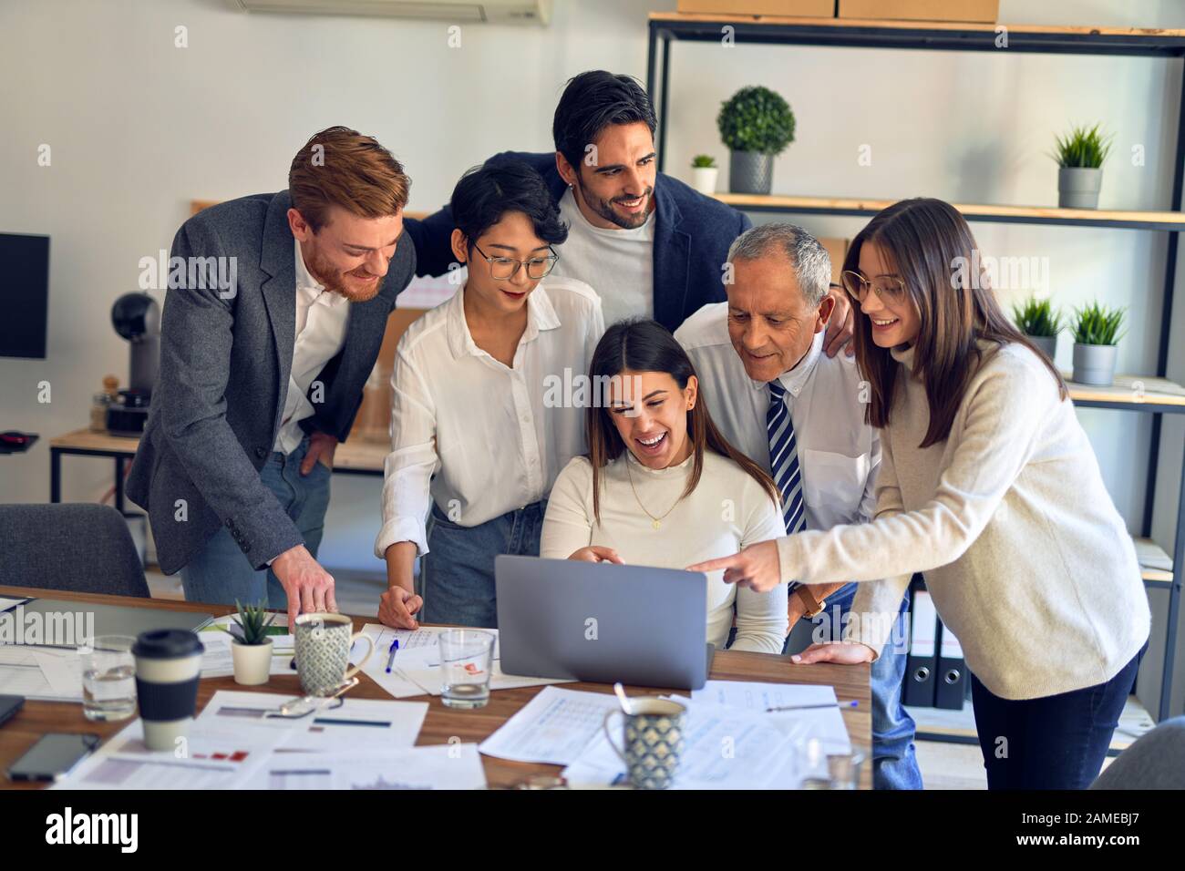 Group of business workers smiling happy and confident. One of them ...