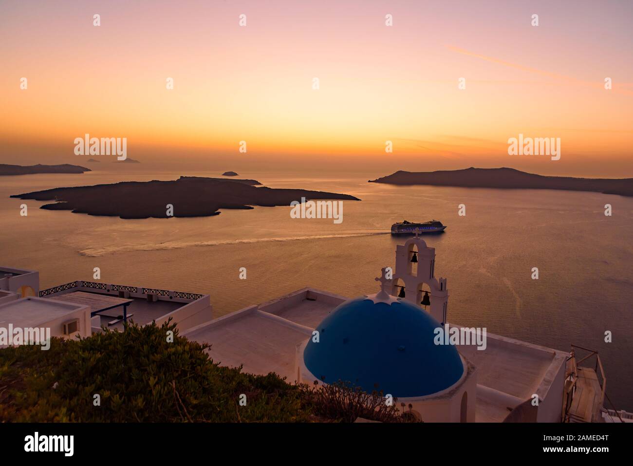 Three Bells of Fira in sunset light, a Greek Catholic church in Fira ...