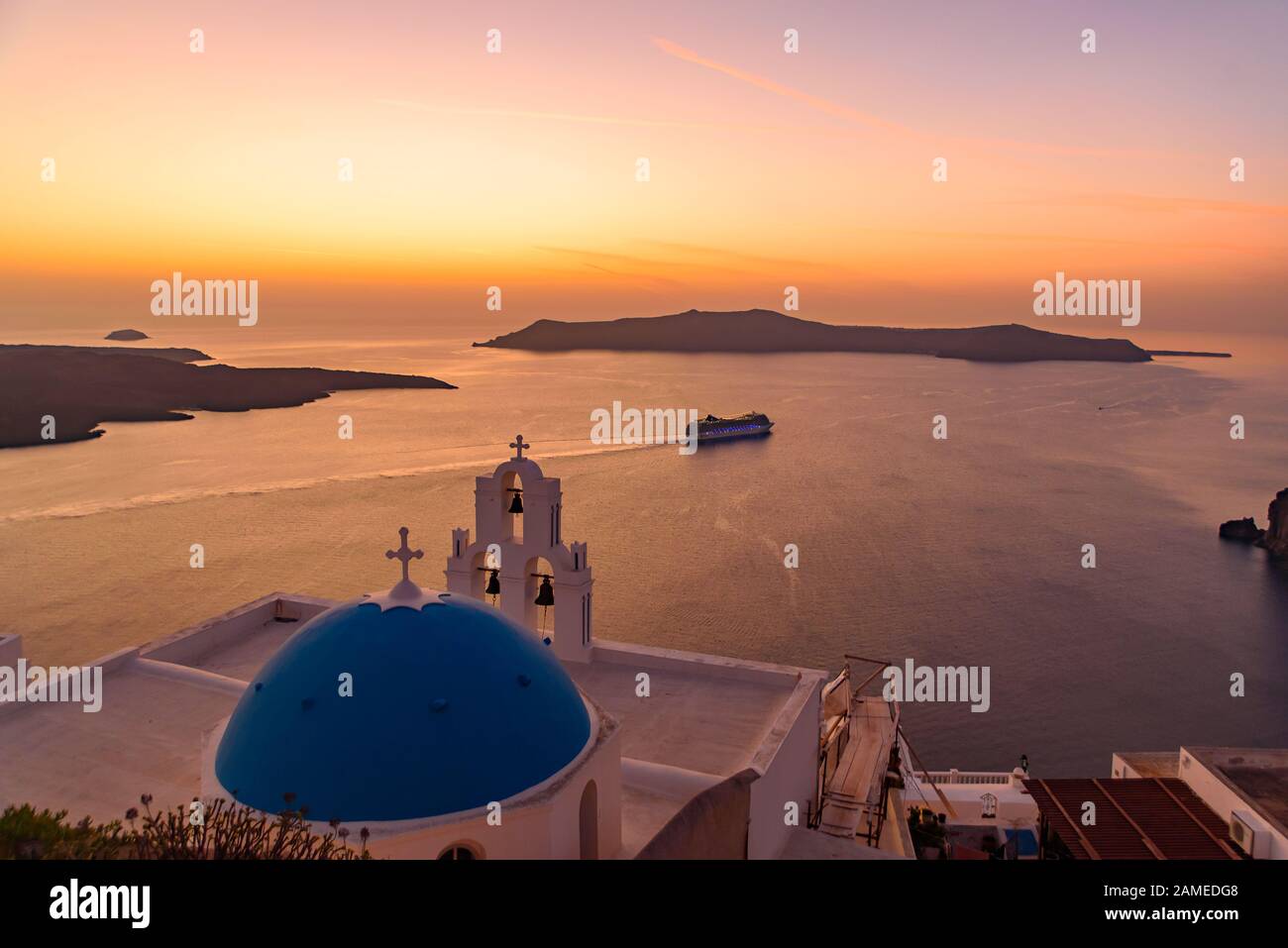 Three Bells of Fira in sunset light, a Greek Catholic church in Fira ...