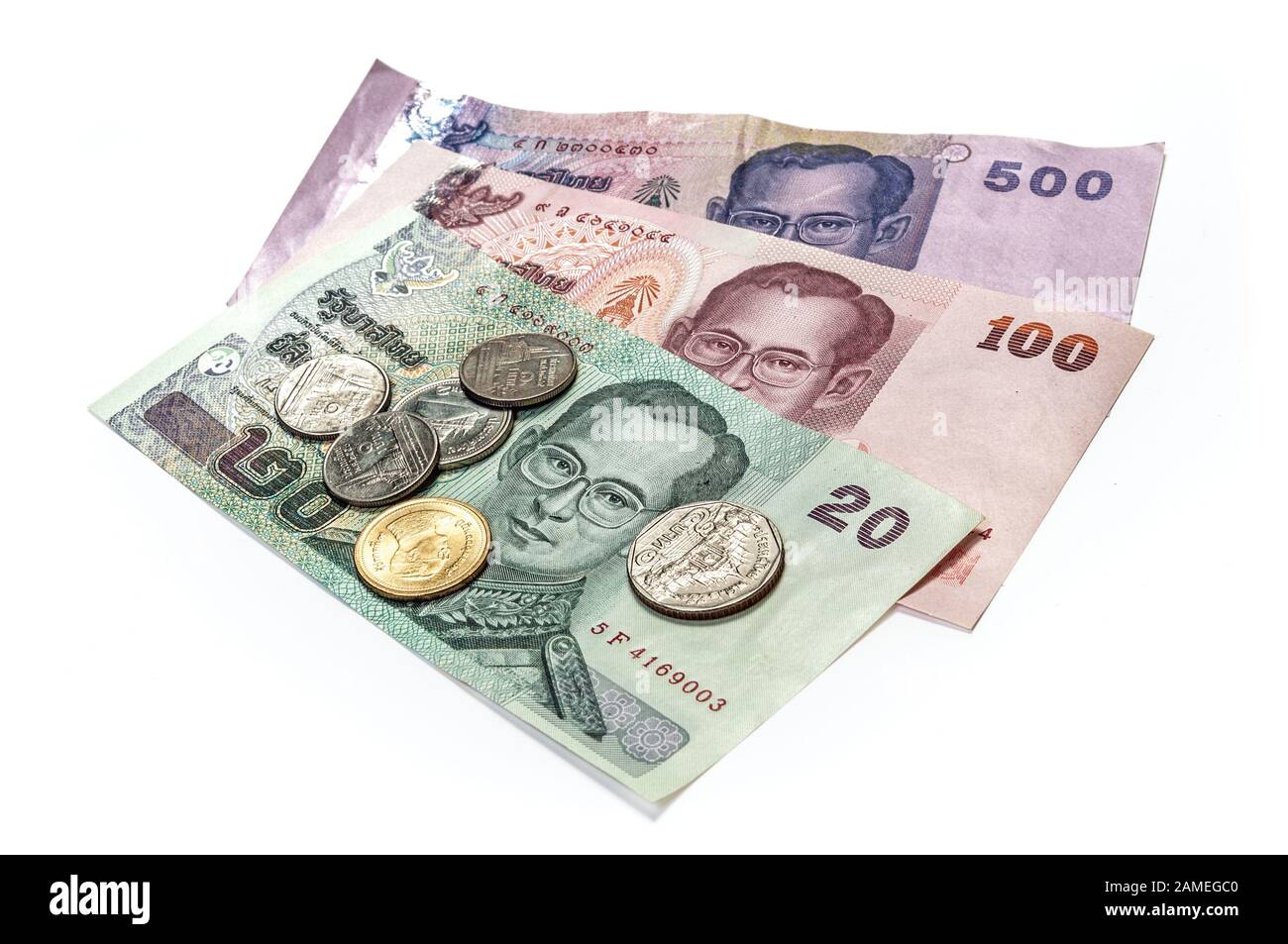 Thailand money close up paper currency and coins isolated over white ...