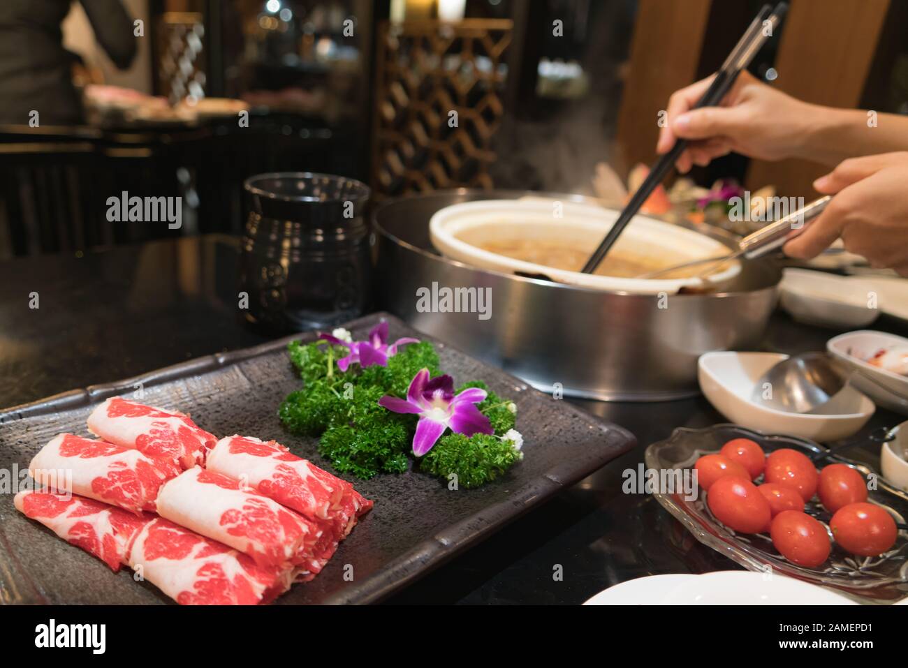fresh meat set with cherry tomato for Chinese shabu restaurant Stock ...
