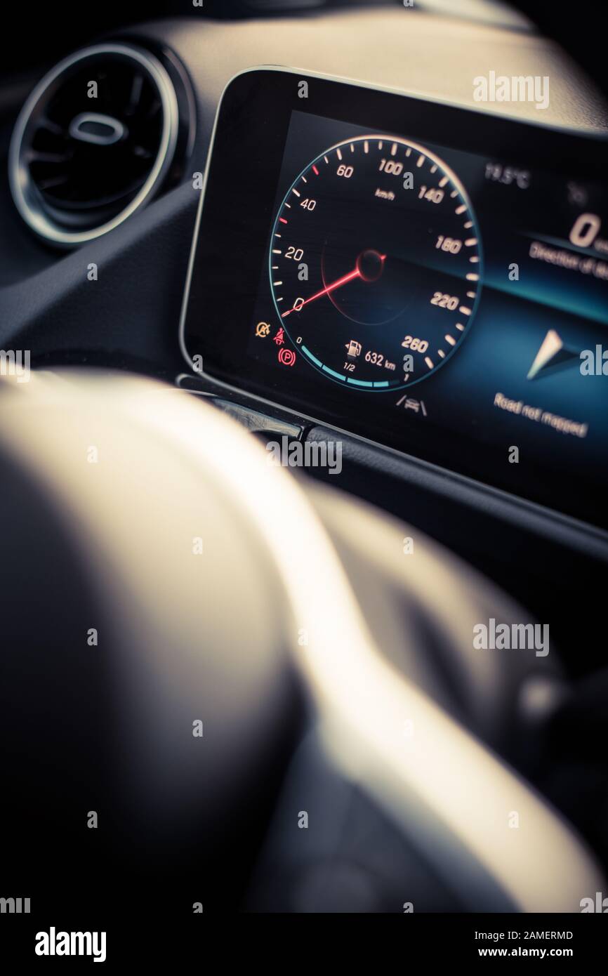 Close up shot with the digital speedometer on a modern car dashboard ...