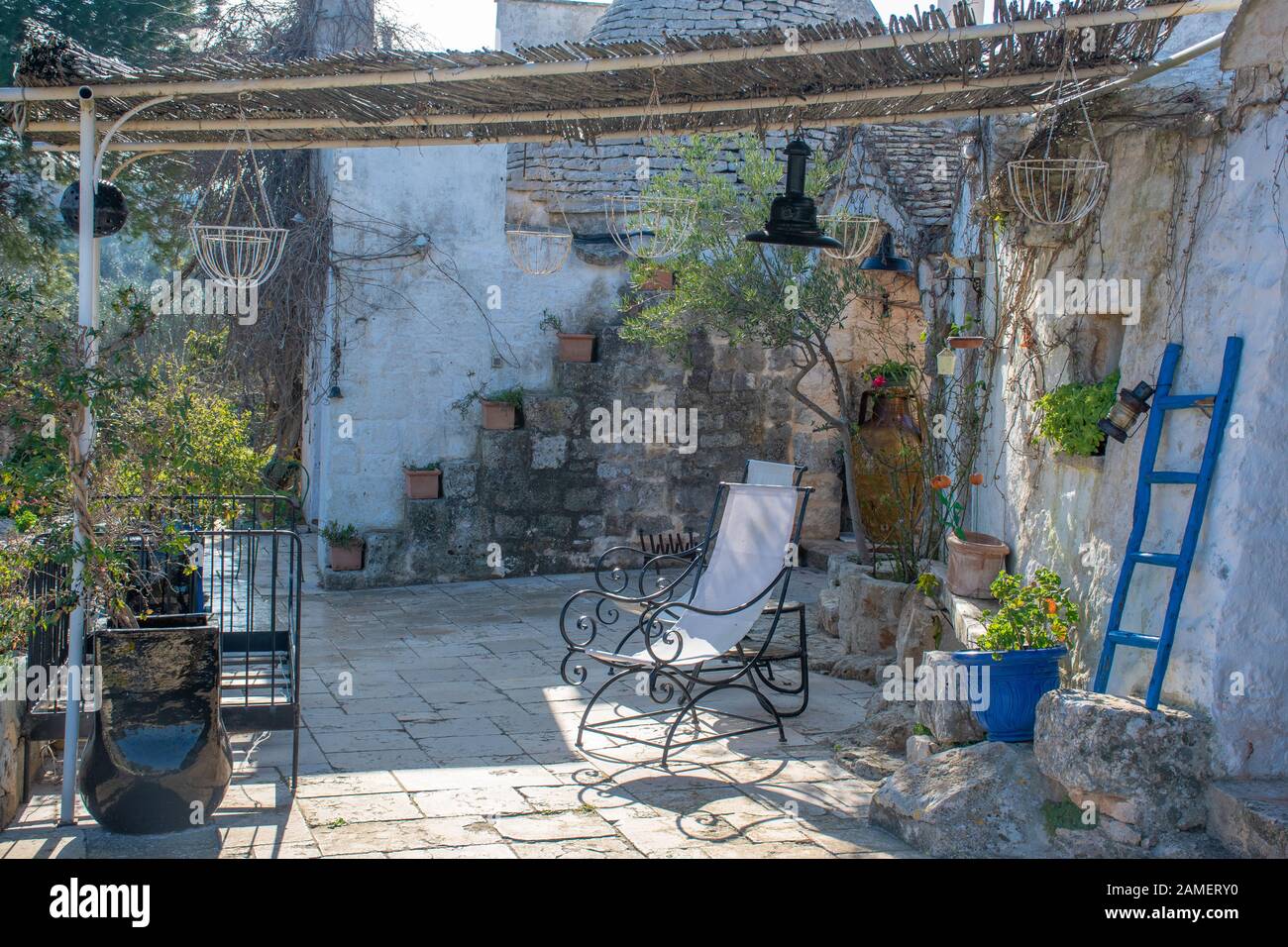 Relaxing veranda in a traditional old country house in Puglia, Italy ...