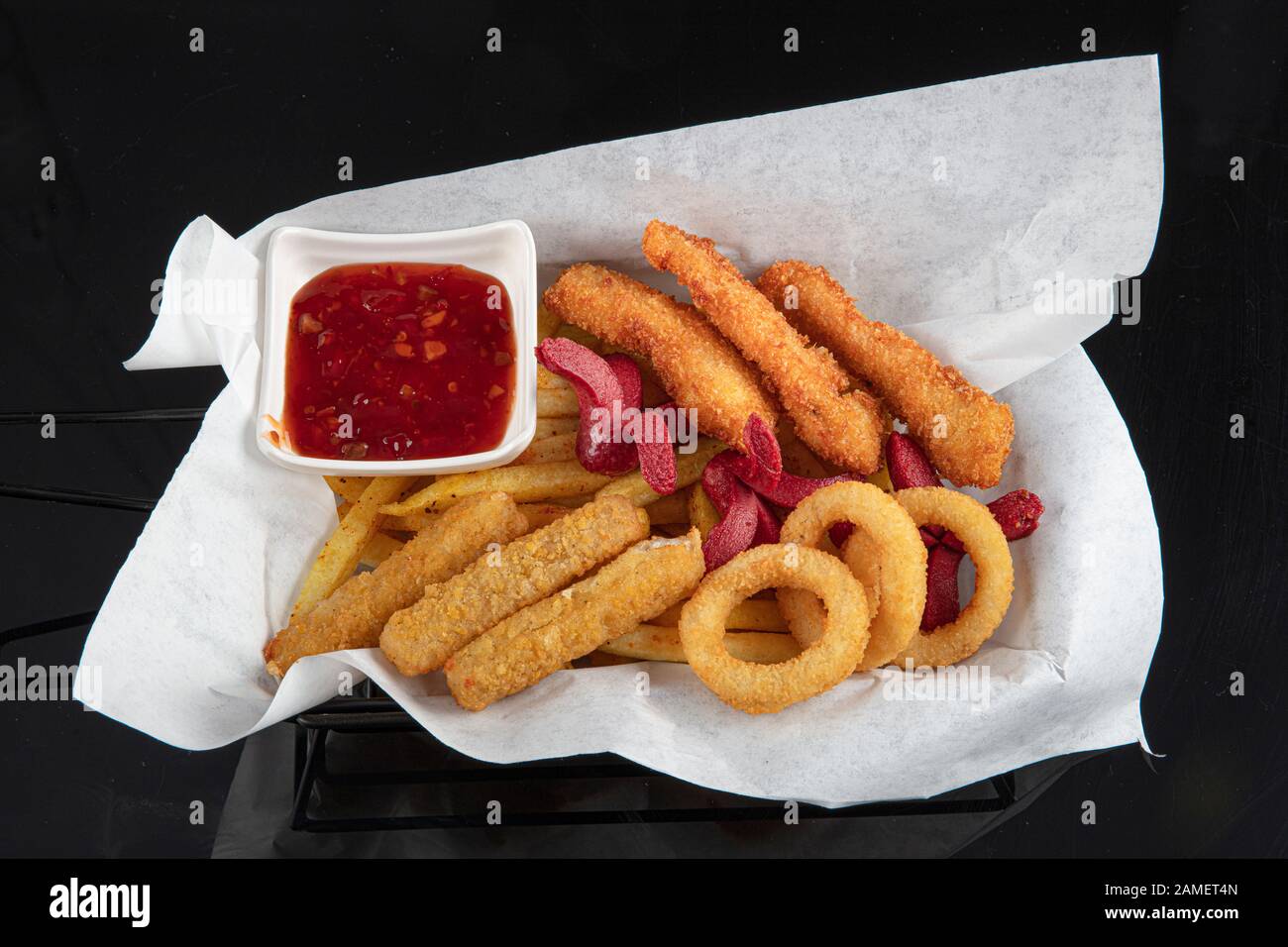 Snack platter - French fries, spring rolls, fried sausage, chicken ...