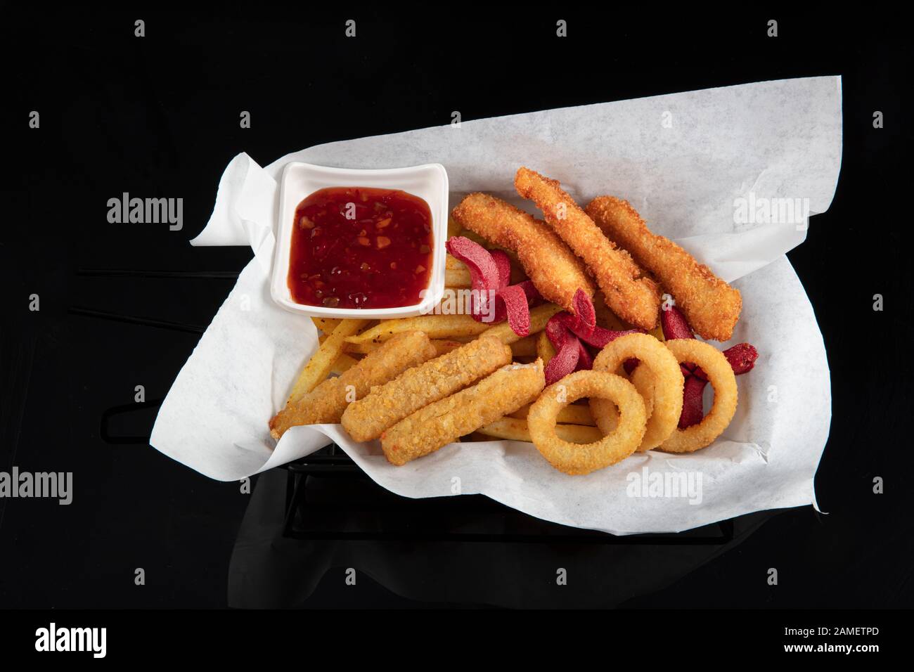 Snack platter - French fries, spring rolls, fried sausage, chicken ...