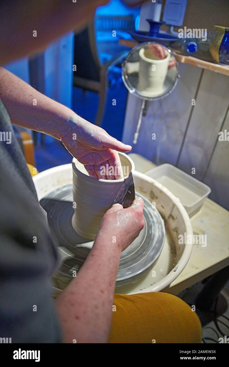 Working with pottery Stock Photo - Alamy