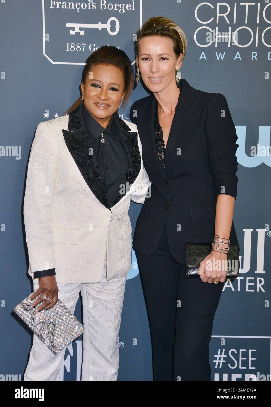 Alex Sykes And Wanda Sykes Kiss