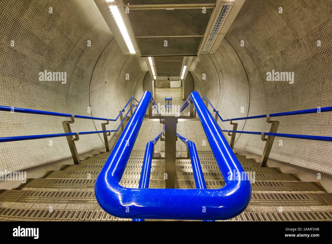 Bright and blue metal handrails in london transportation network ...