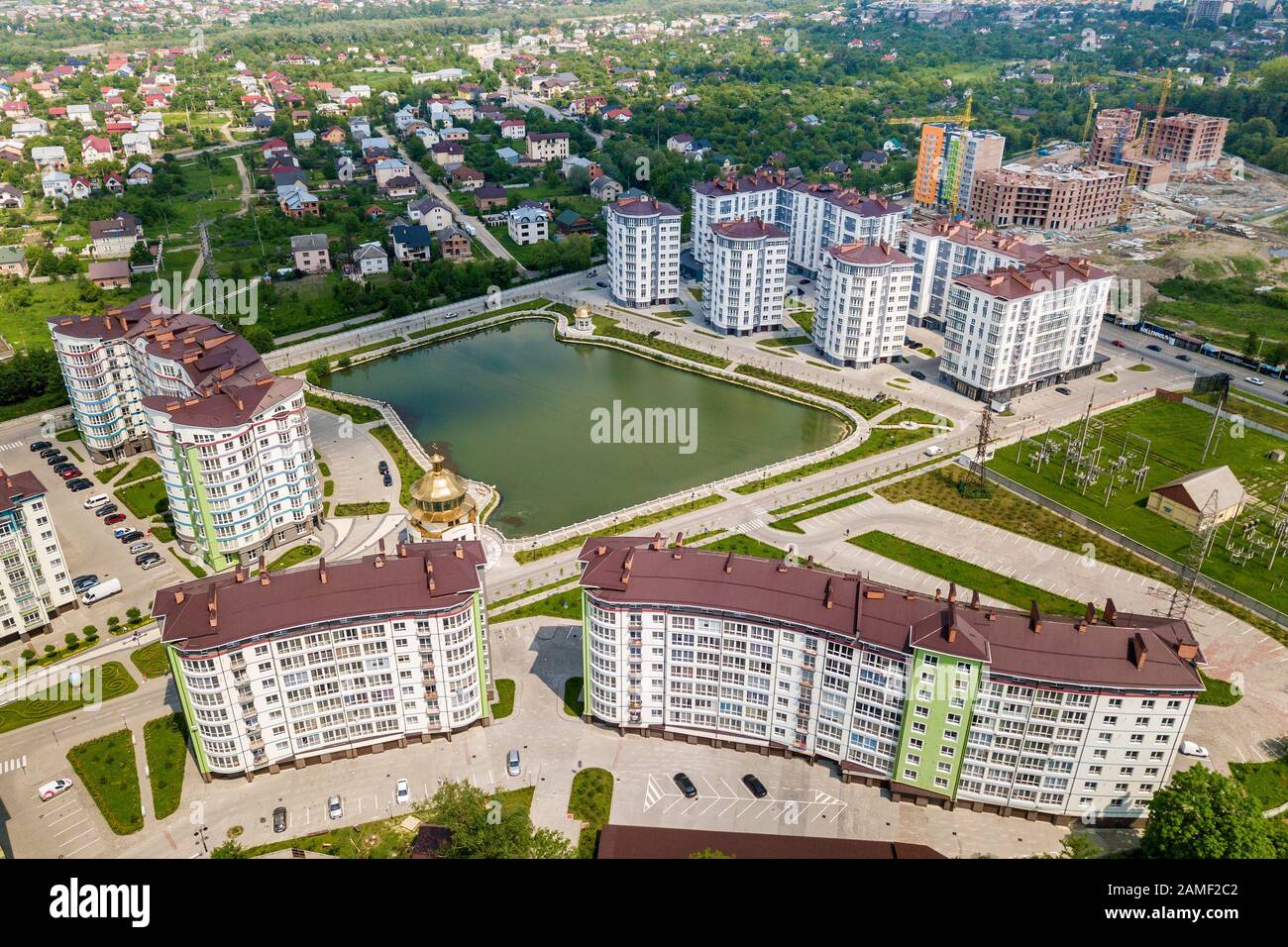 Top view of urban developing city landscape with tall apartment ...